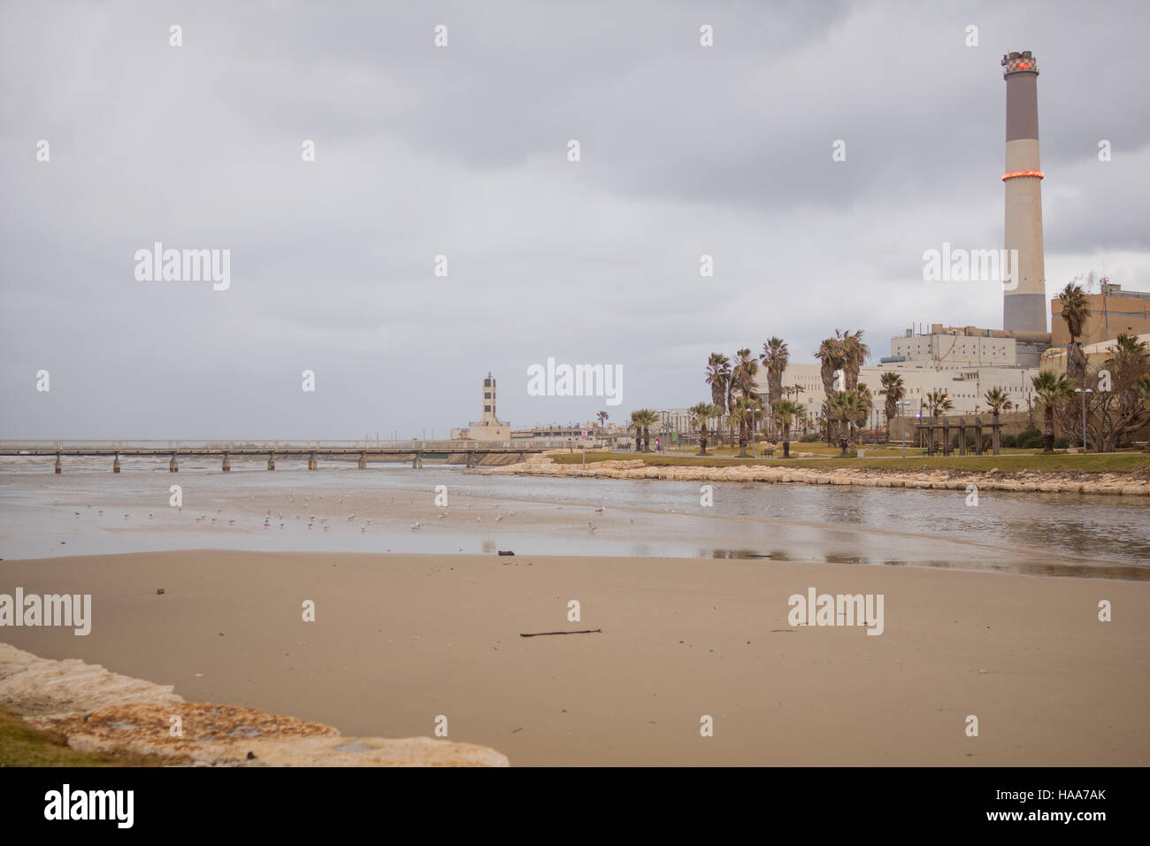 Winter scene with the Yarkon stream, Reading Power Station, lighthouse ...