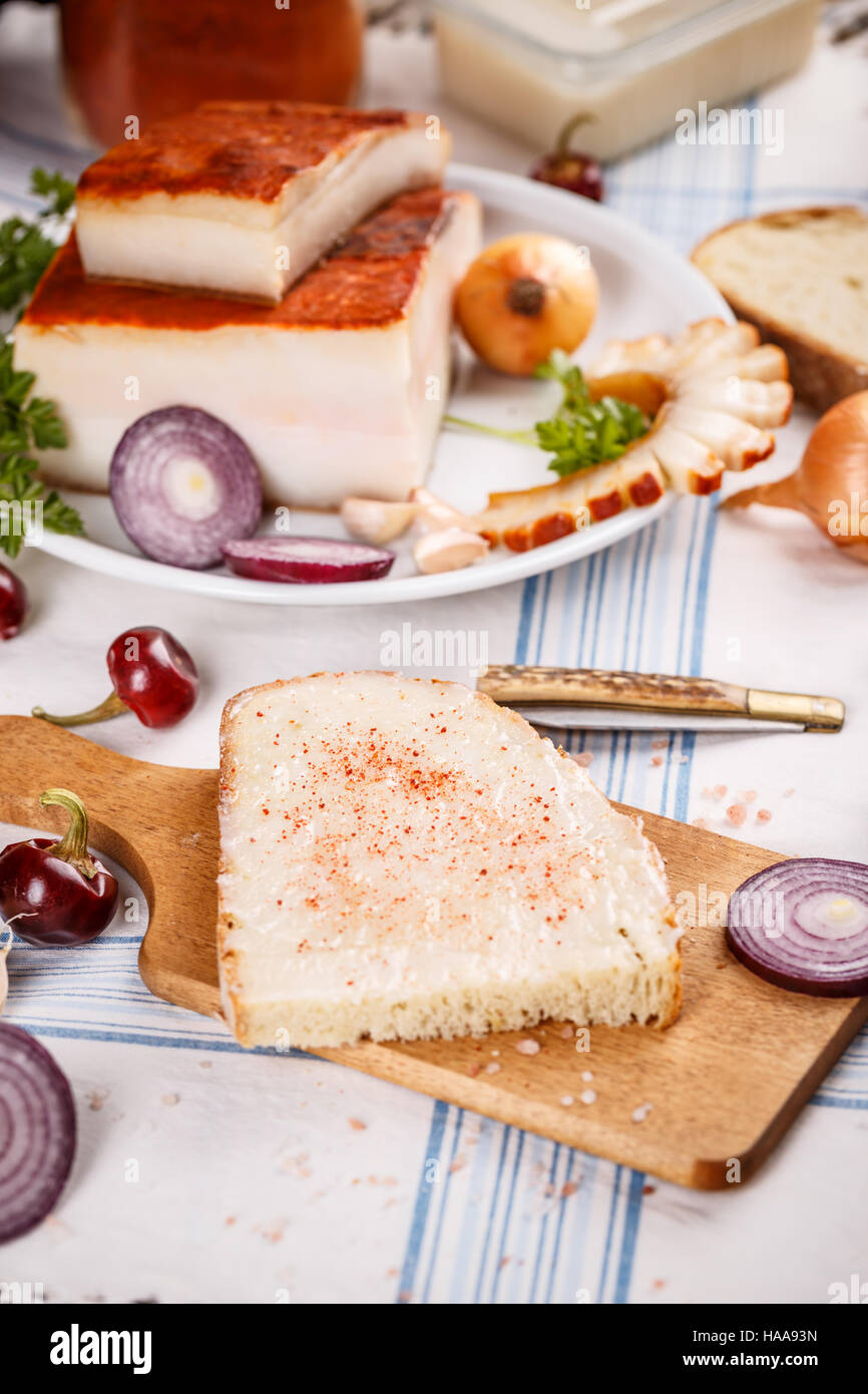 A slice of bread spread with lard was a typical staple in traditional ...