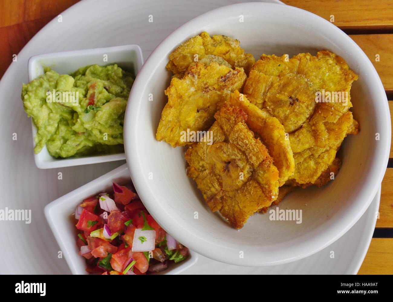 Fried plantain tostones (patacones) in Costa Rica Stock Photo - Alamy