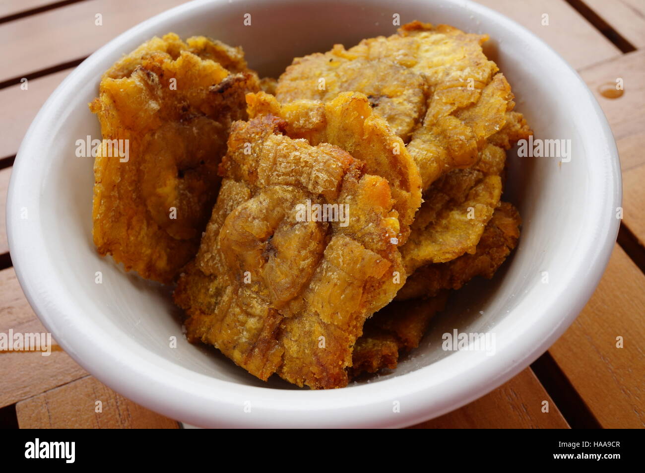 Fried plantain tostones (patacones) in Costa Rica Stock Photo - Alamy