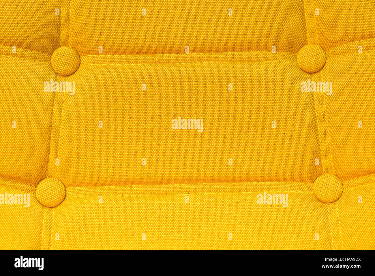 Buttoned chair back support detail, yellow fiber material texture Stock ...
