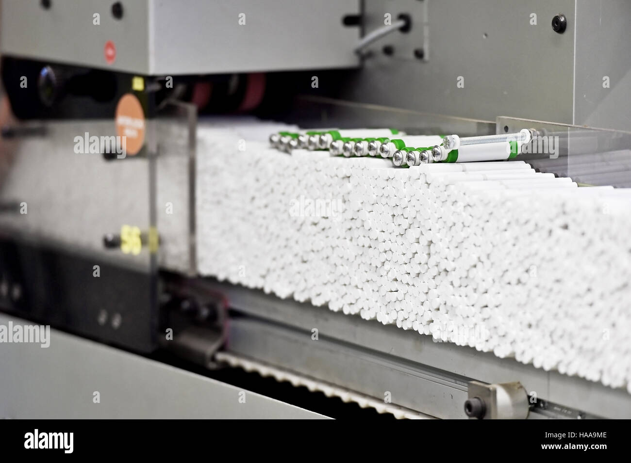 Cigarettes production process inside a modern factory Stock Photo - Alamy