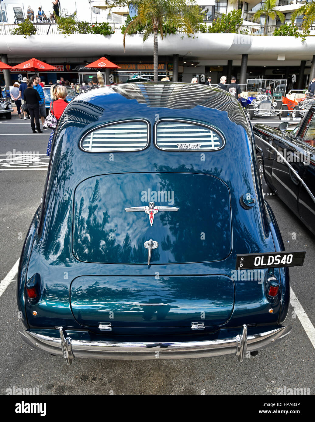 rear view of vintage oldsmobile with rear split screen in blue at the ...