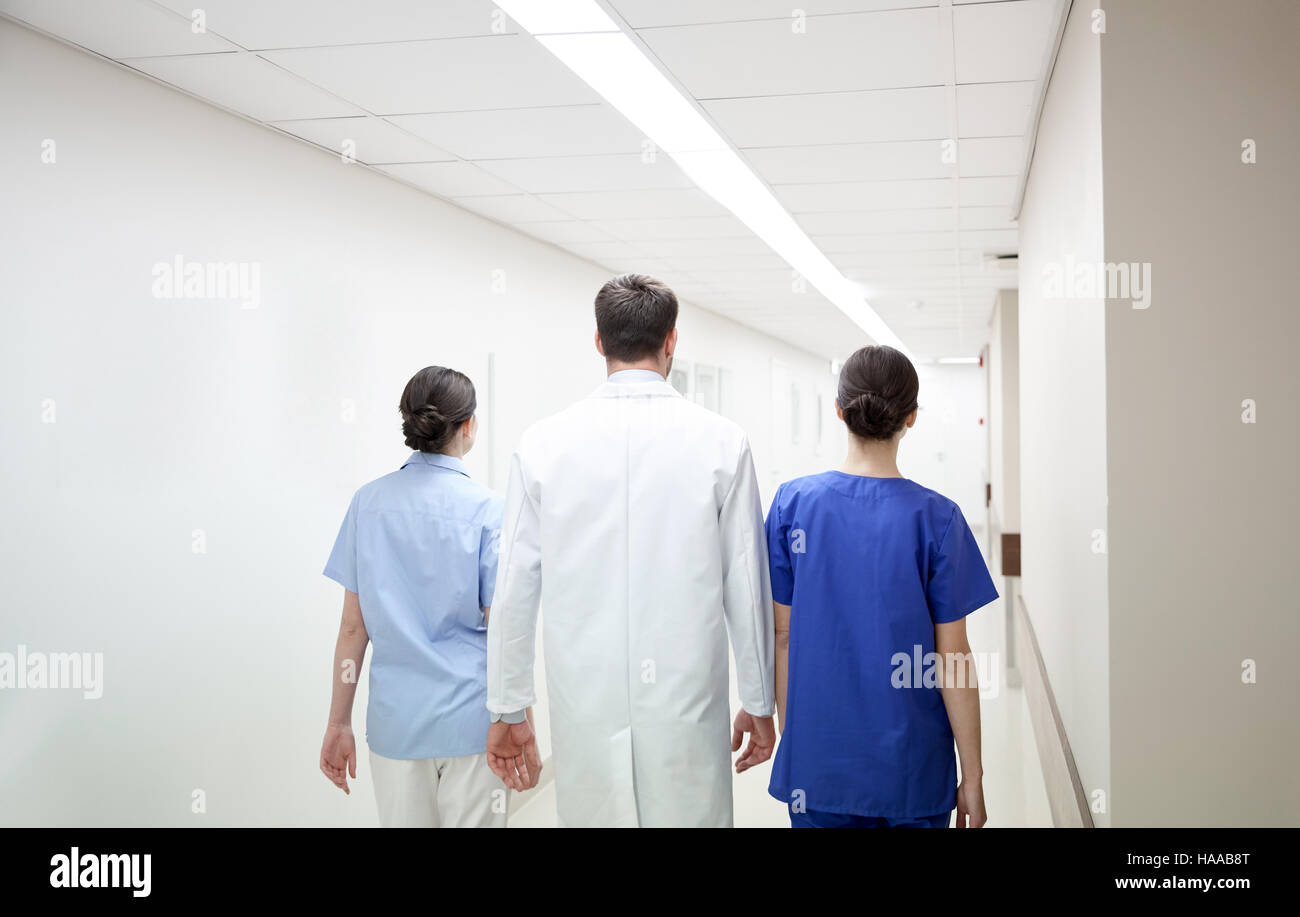 group of medics or doctors walking along hospital Stock Photo - Alamy