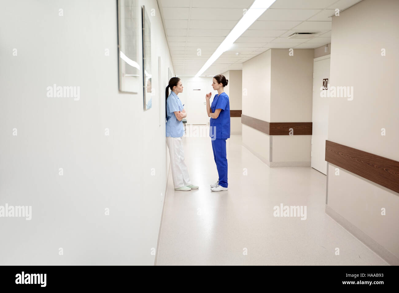 female doctors or nurses talking at hospital Stock Photo - Alamy