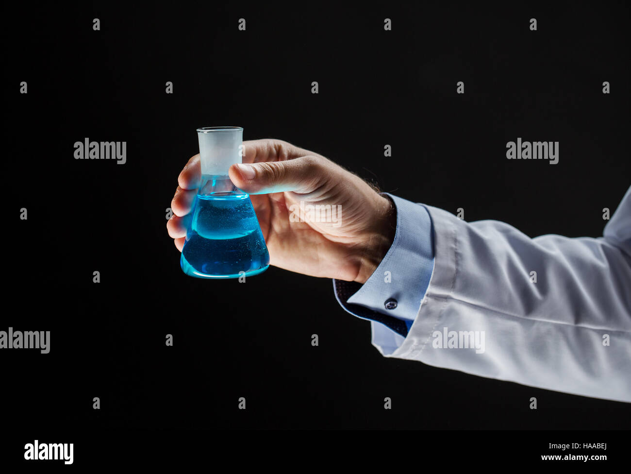 Hand holding chemical flask isolated hi-res stock photography and ...
