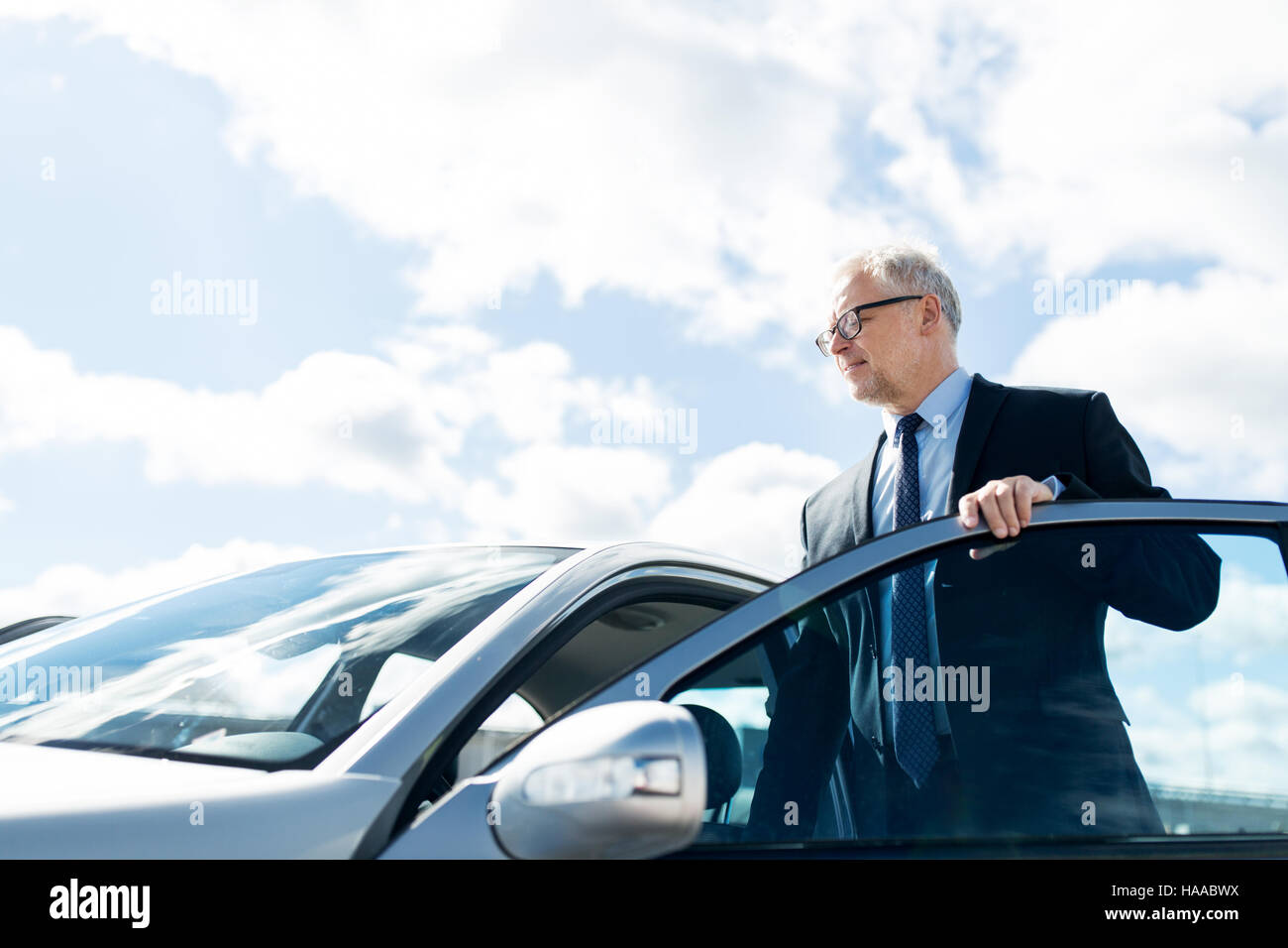 Getting into car hi-res stock photography and images - Alamy