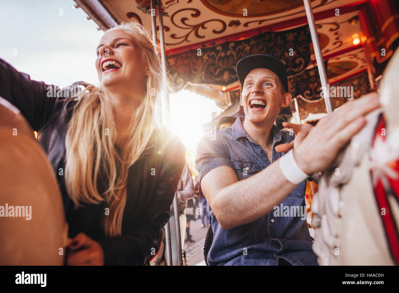 Riding on carousel horse hi-res stock photography and images - Alamy