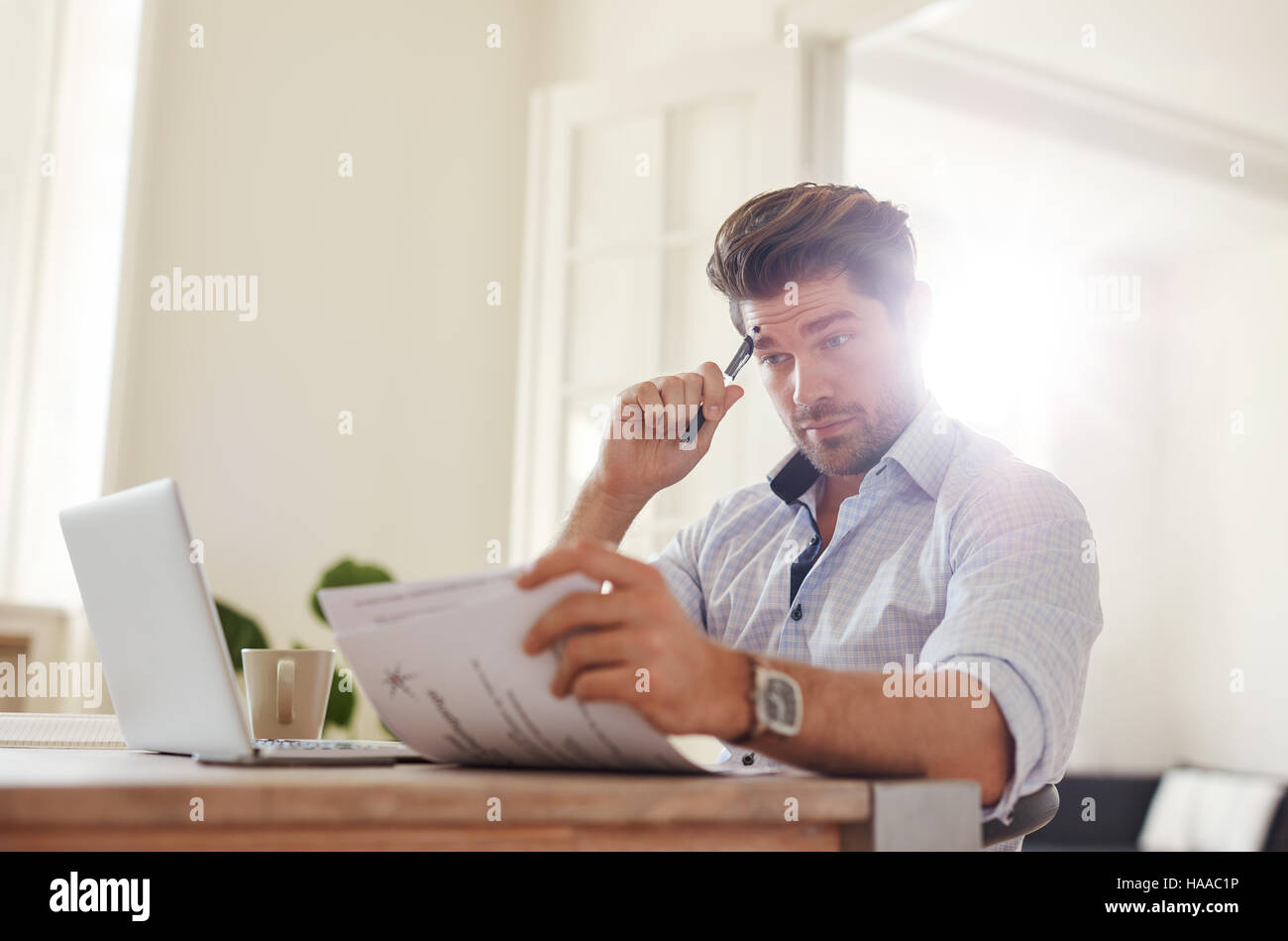 Going through paperwork hi-res stock photography and images - Alamy