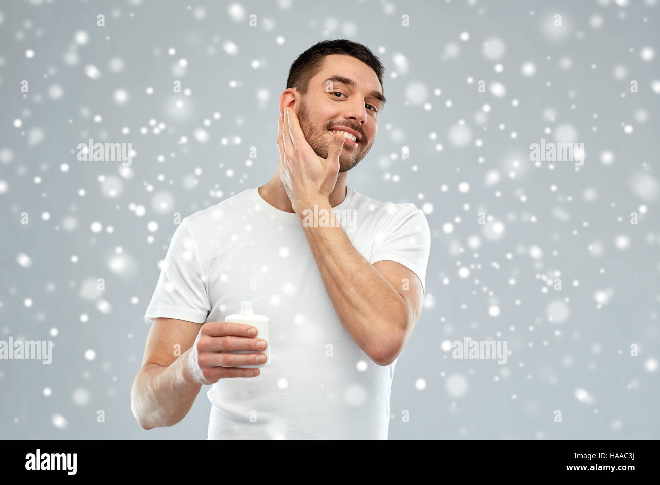 Man applying lotion hi-res stock photography and images - Alamy