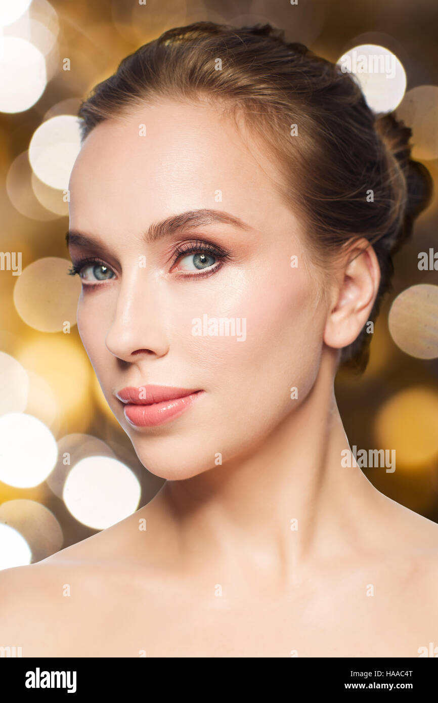 beautiful young woman face over white background Stock Photo - Alamy