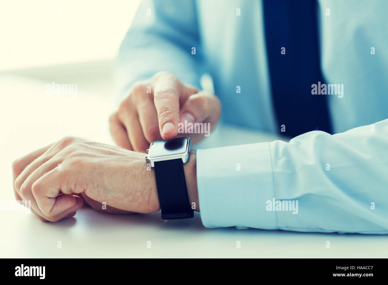 close up of male hands setting smart watch Stock Photo - Alamy