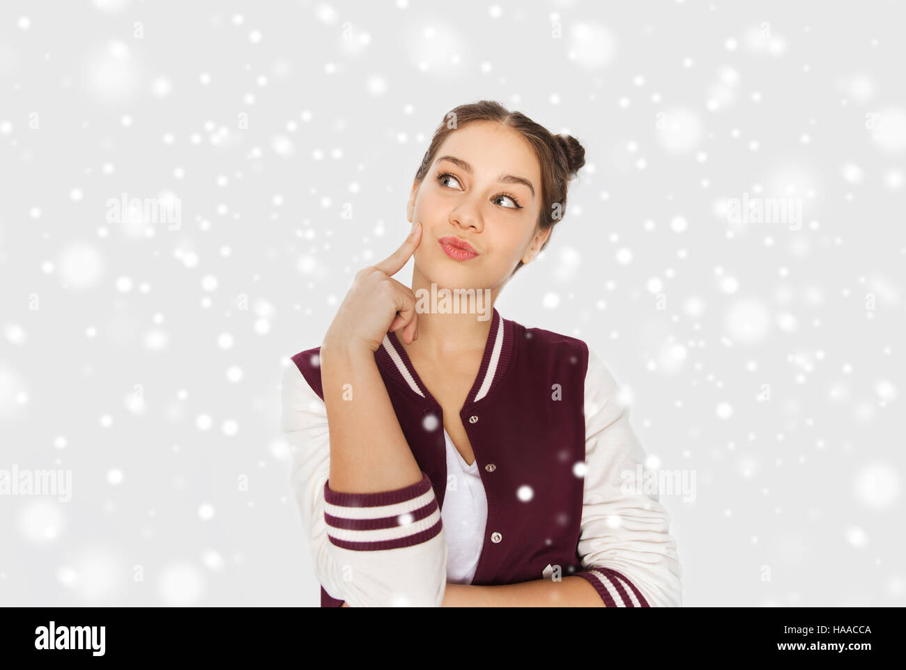 happy pretty teenage girl thinking Stock Photo - Alamy