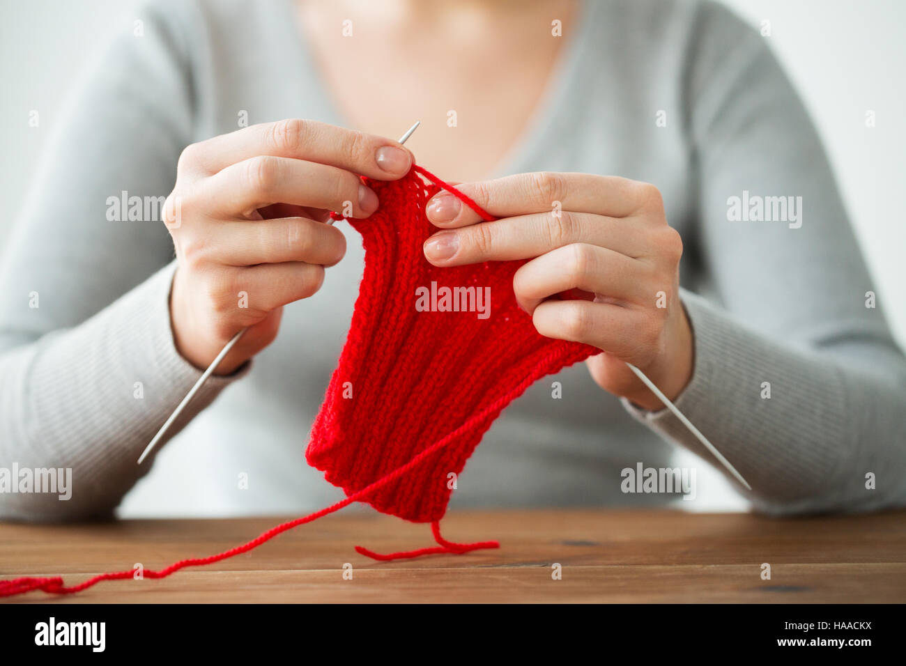 woman hands knitting with needles and yarn Stock Photo - Alamy