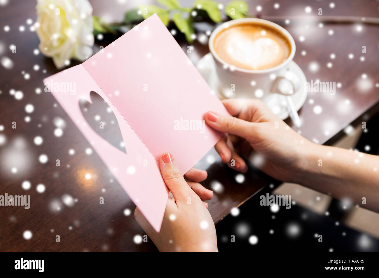 close up of woman reading greeting card and coffee Stock Photo - Alamy