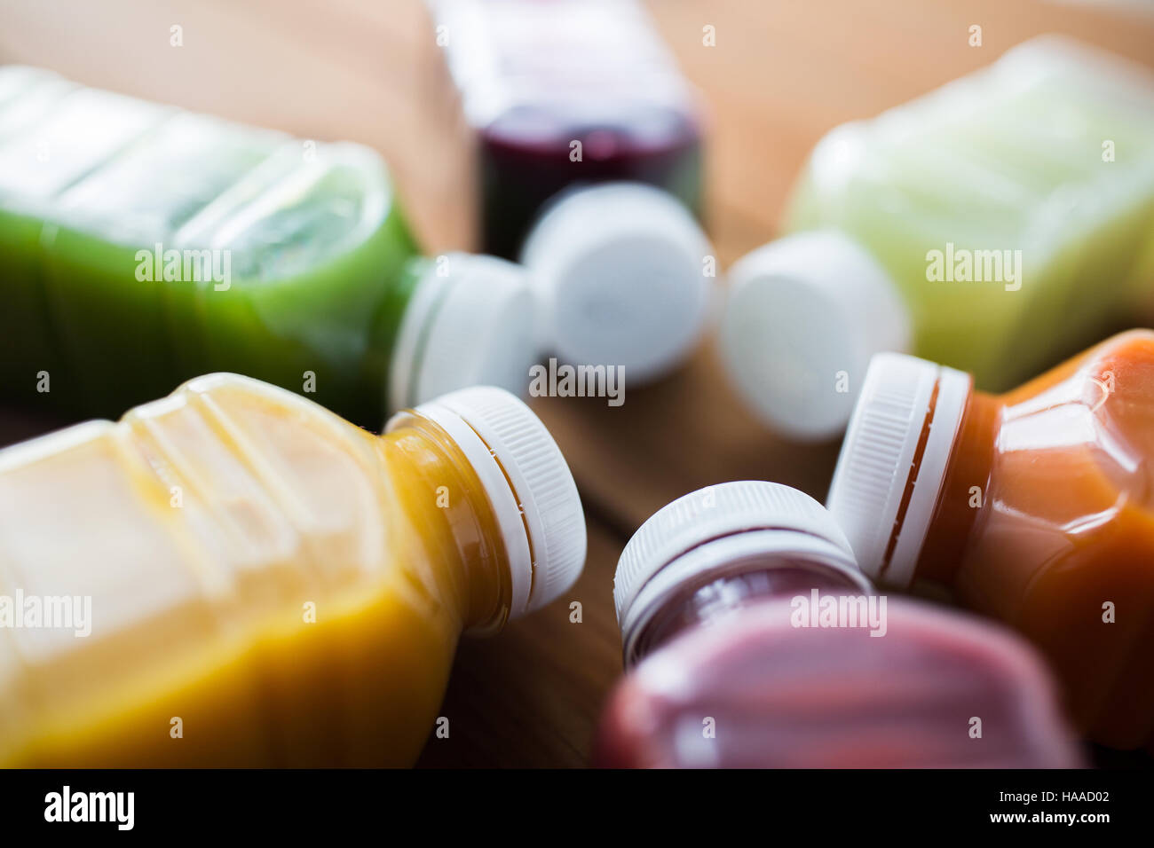bottles with different fruit or vegetable juices Stock Photo - Alamy