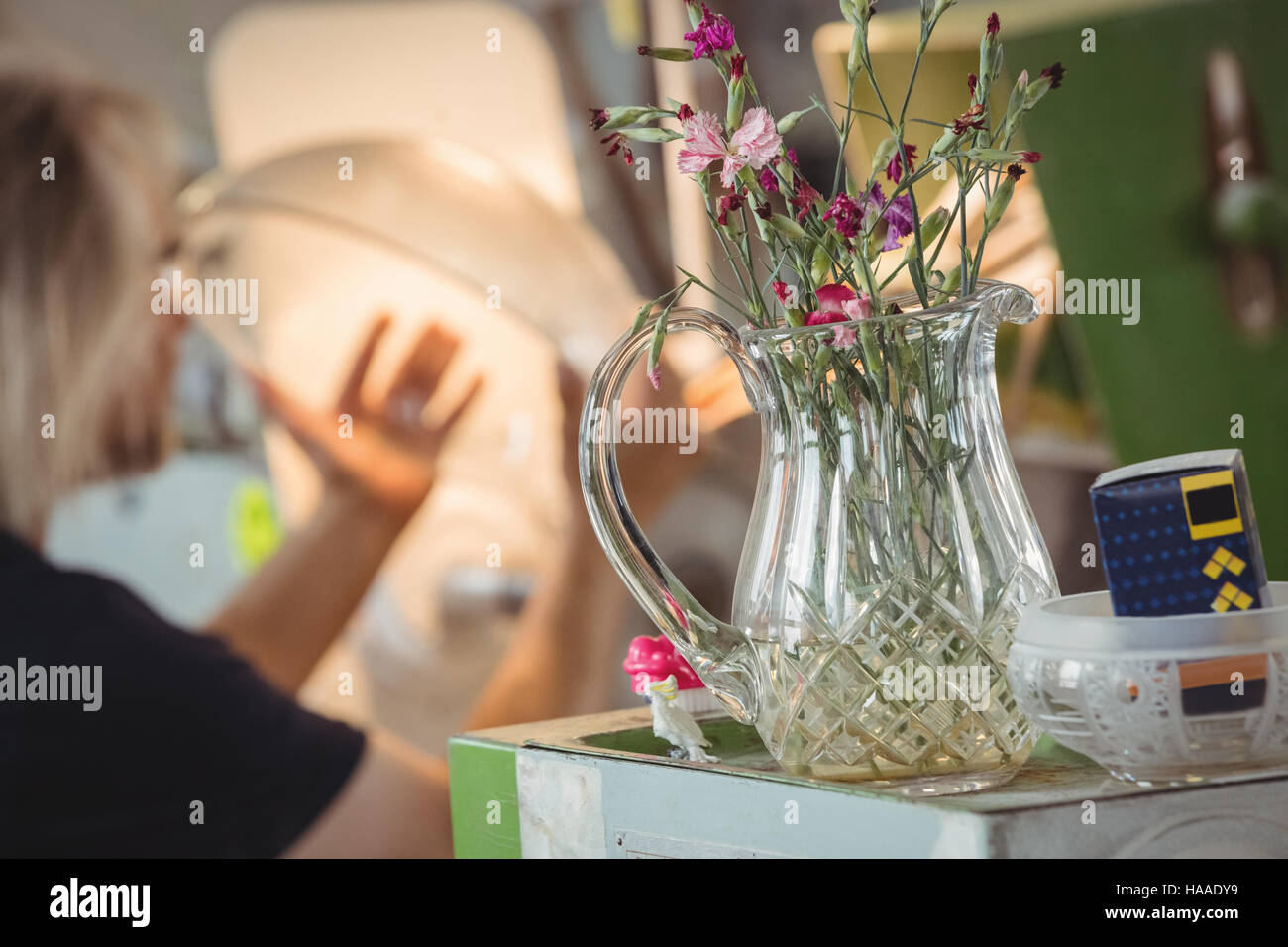 Glassblower polishing and grinding a glassware Stock Photo - Alamy
