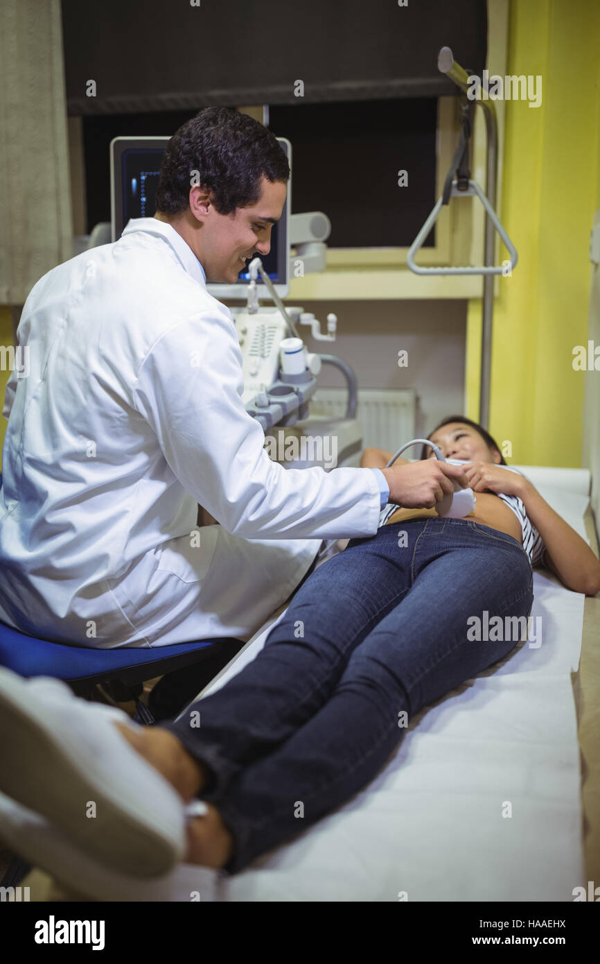 Female patient receiving a ultrasound scan on the stomach Stock Photo ...