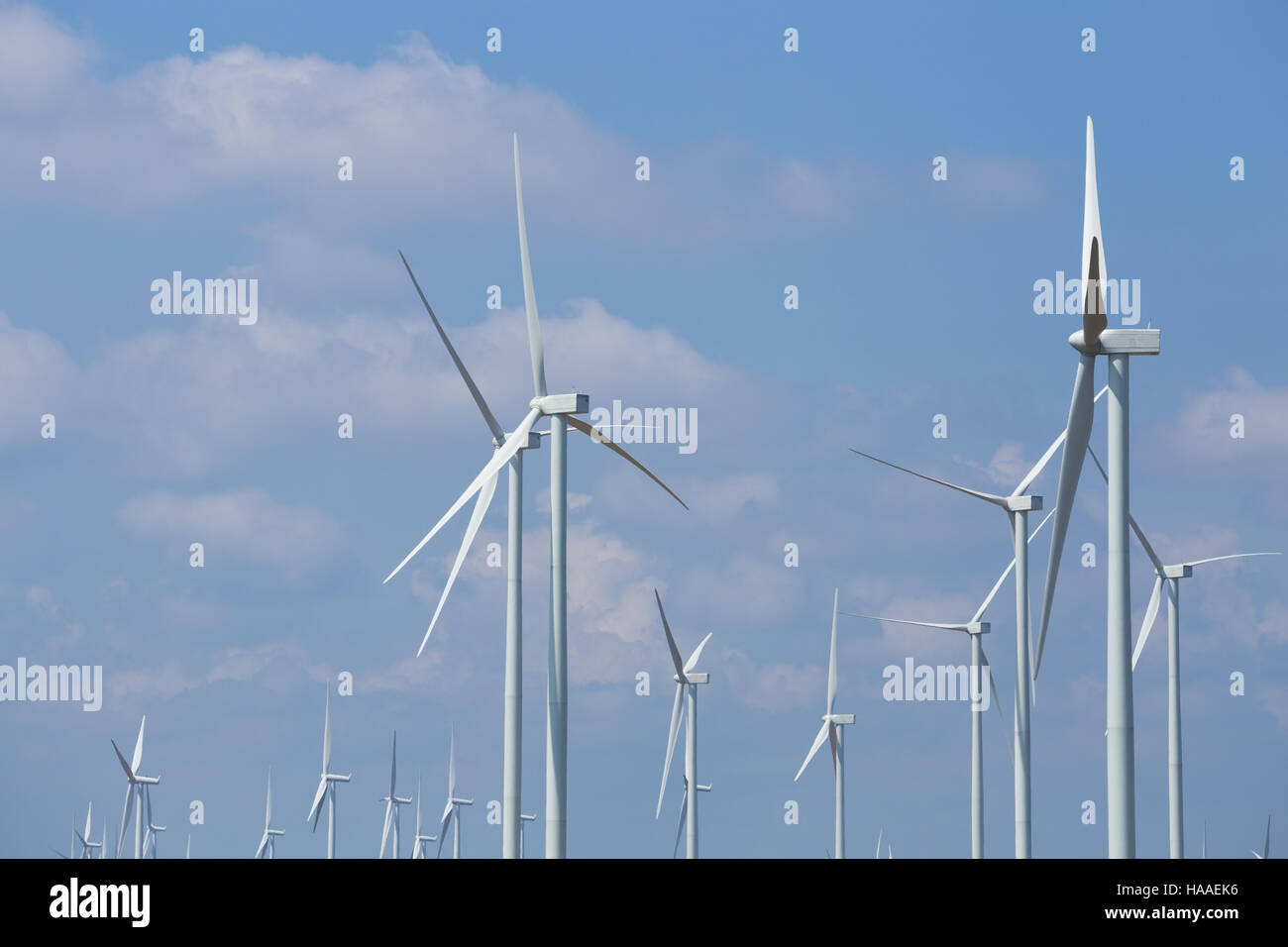 Wind Turbine in wind farm with cloud sky Stock Photo - Alamy