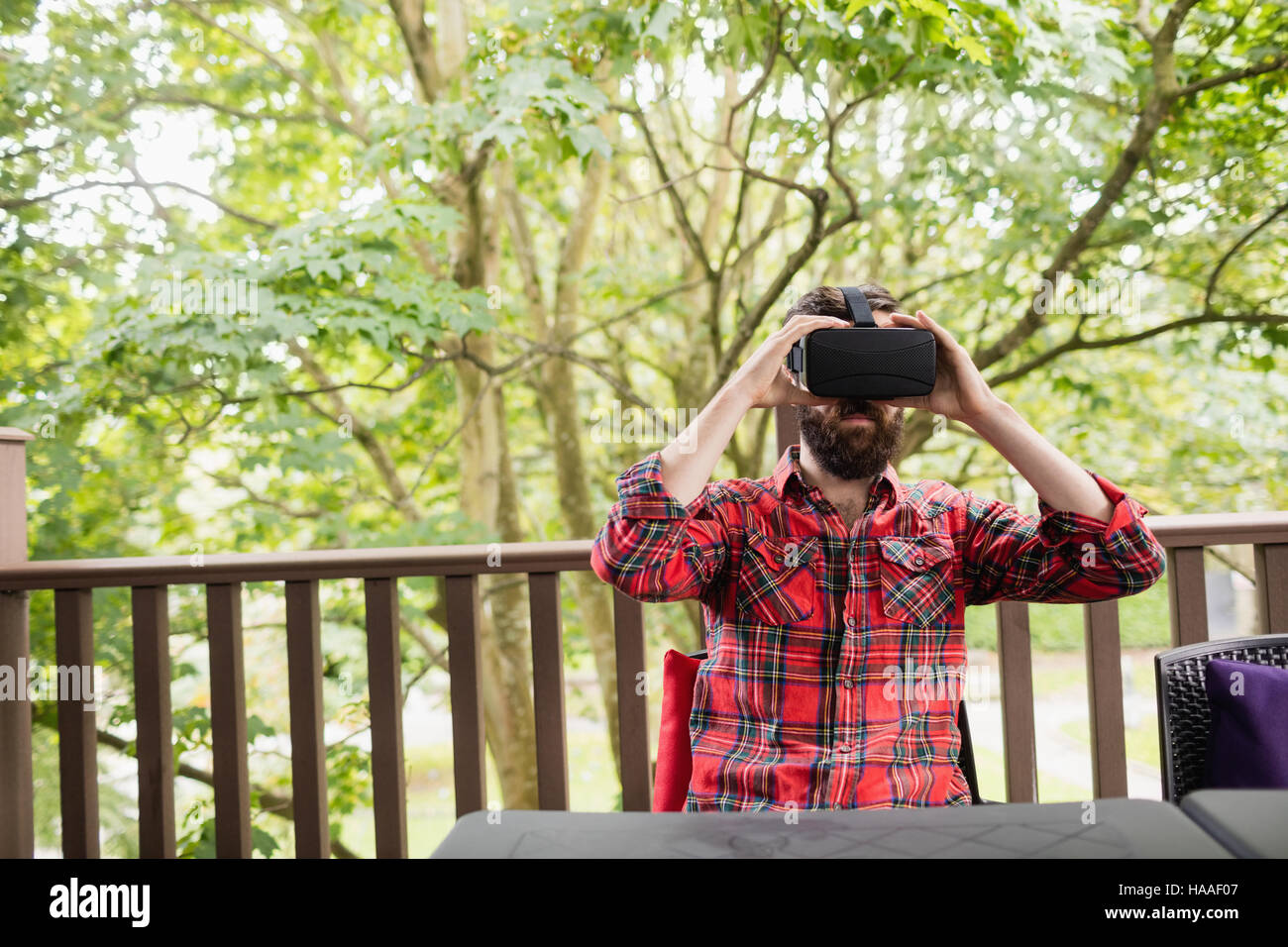 Man using virtual reality headset Stock Photo - Alamy Man using virtual reality headset Stock Photo - Alamy