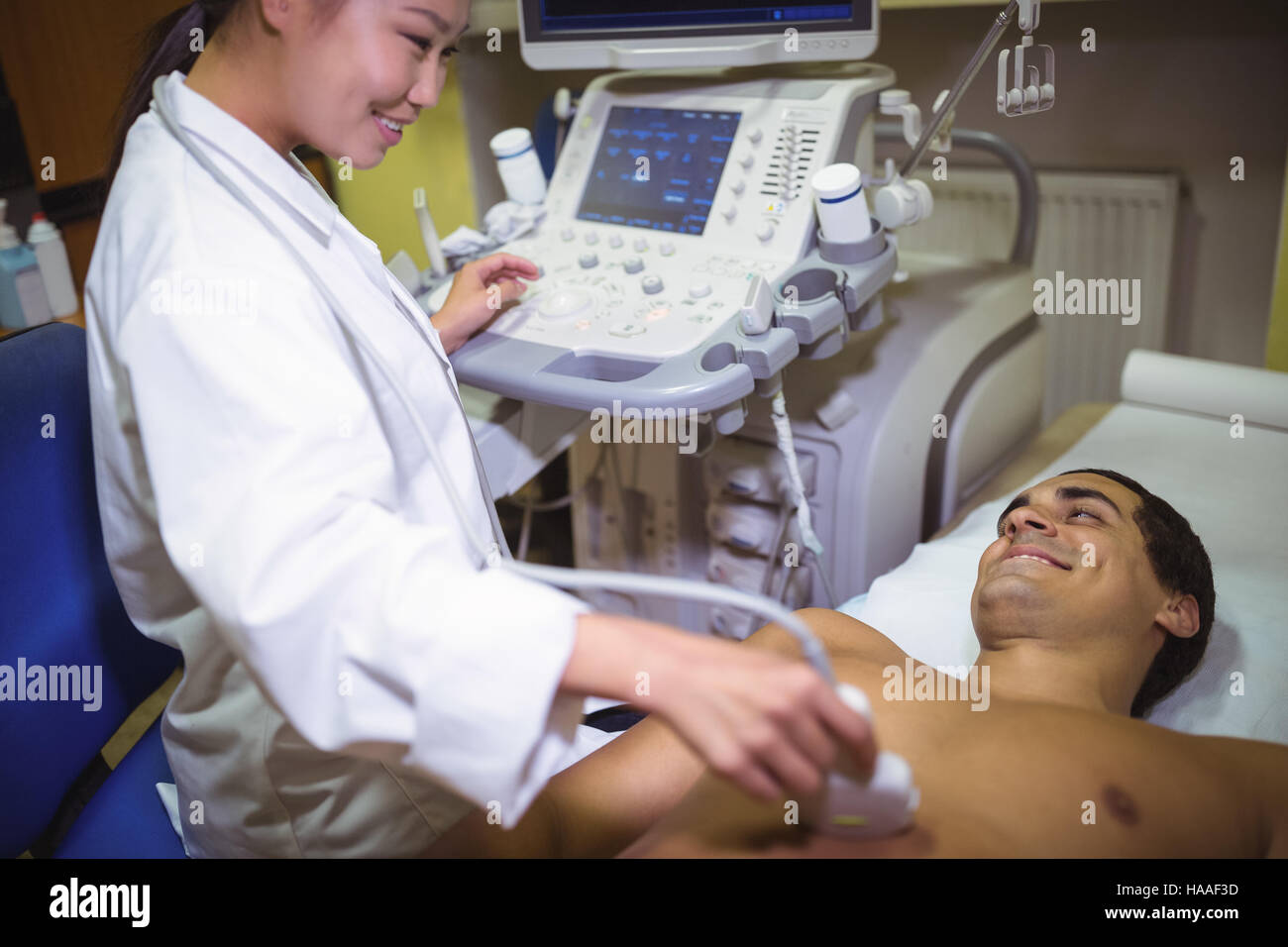 Male patient receiving a ultrasound scan on the chest Stock Photo - Alamy