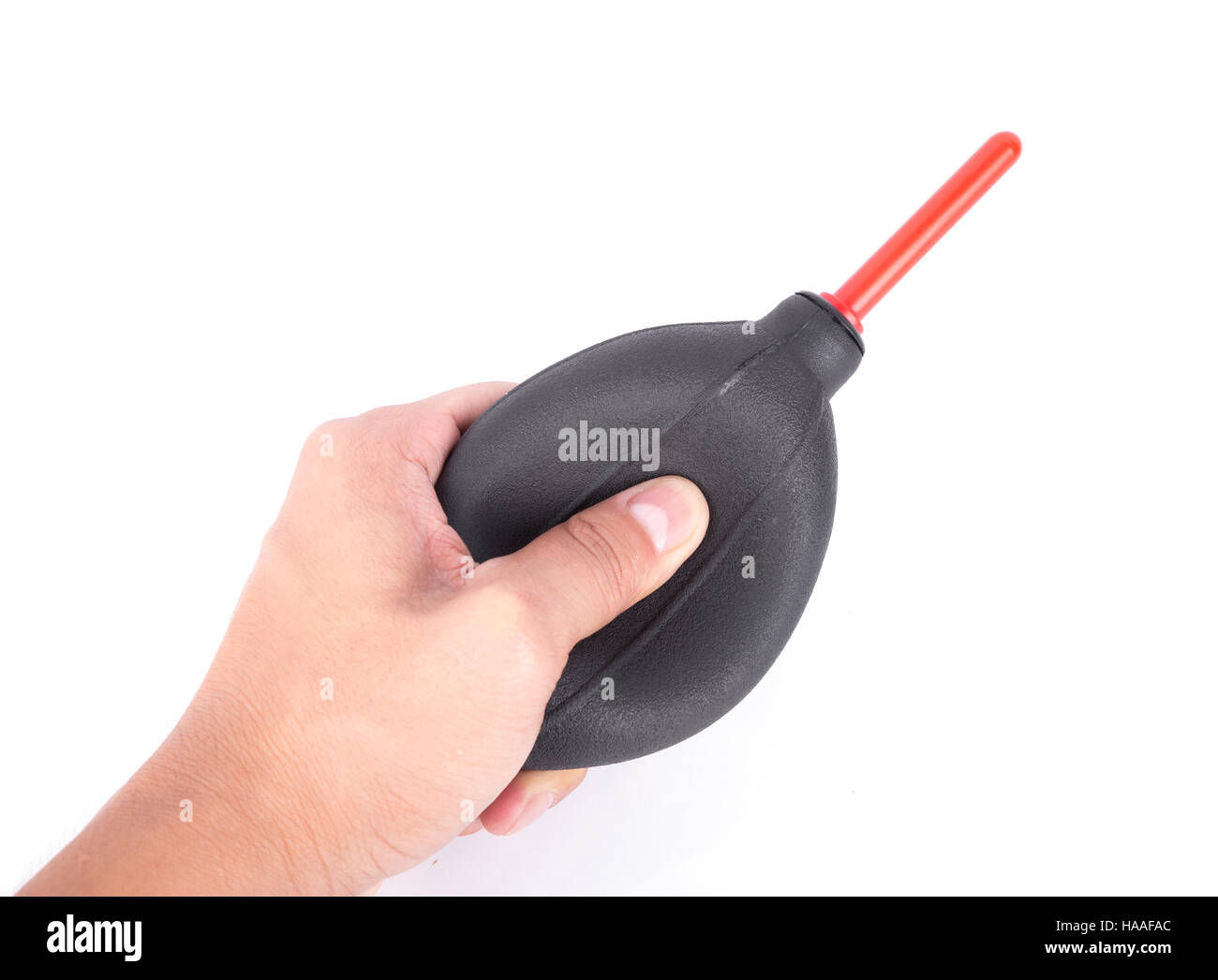 hand holding air dust blower for camera cleaning isolated on white ...