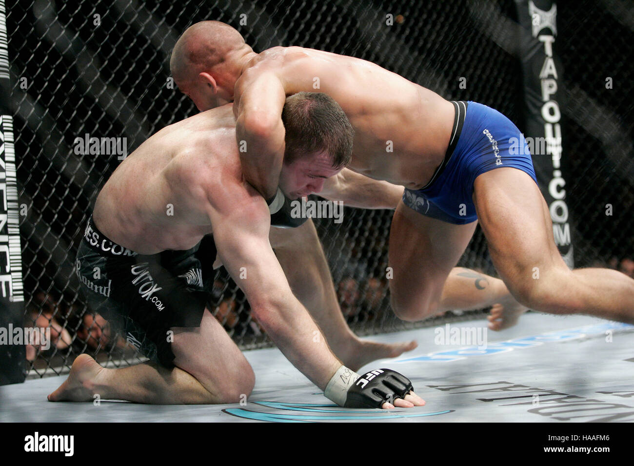 Georges St. Pierre, right, fights Matt Hughes during UFC 79 at the ...