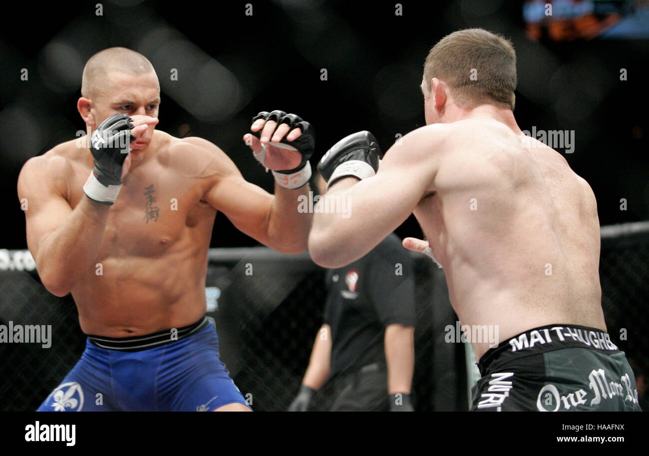 Georges St. Pierre, left, fights Matt Hughes during UFC 79 at the ...