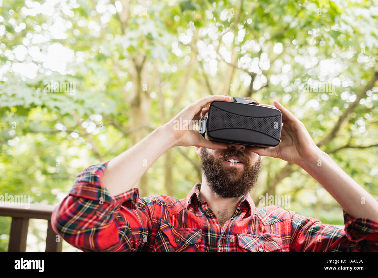 Man using virtual reality headset Stock Photo - Alamy