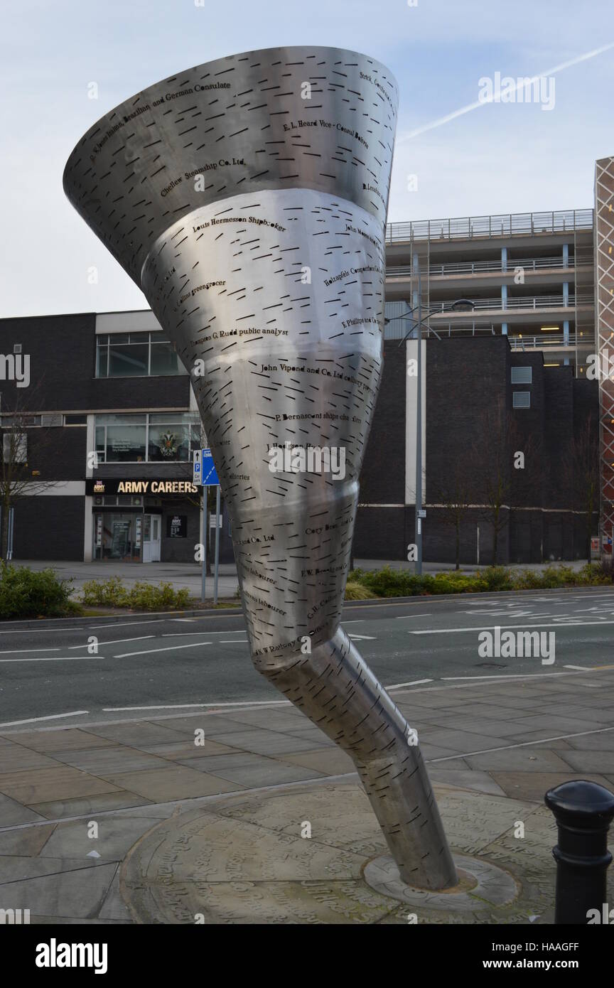 Modern conical stainless steel sculpture in Newport, Gwent set against ...