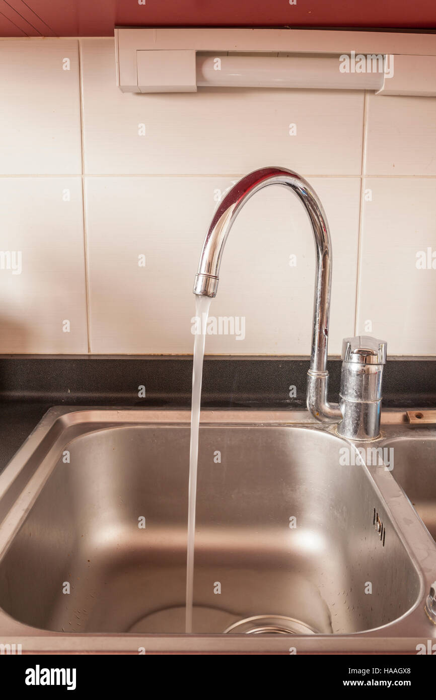 A running tap Stock Photo - Alamy