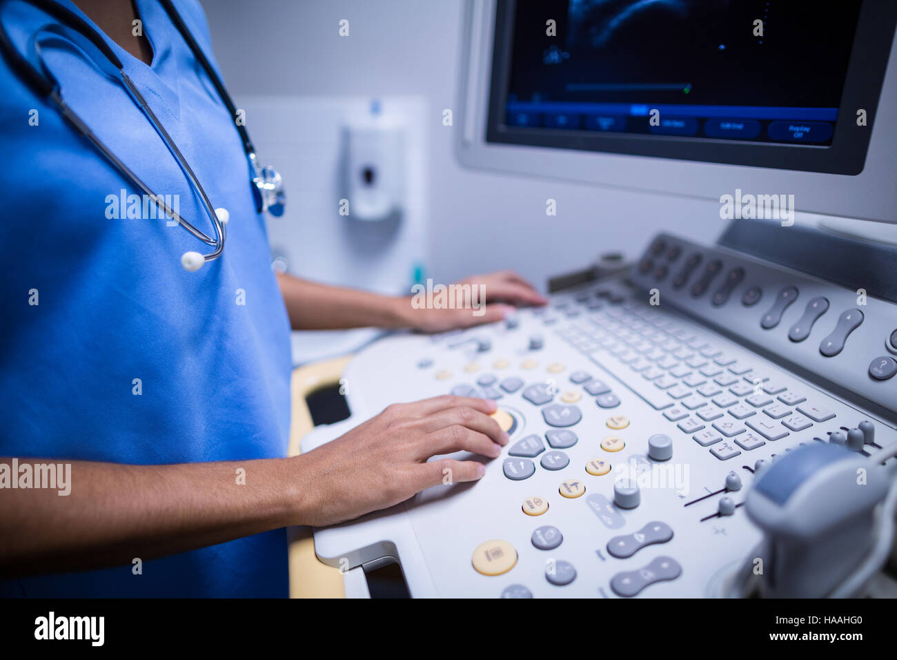 Nurse using ultrasonic device Stock Photo - Alamy