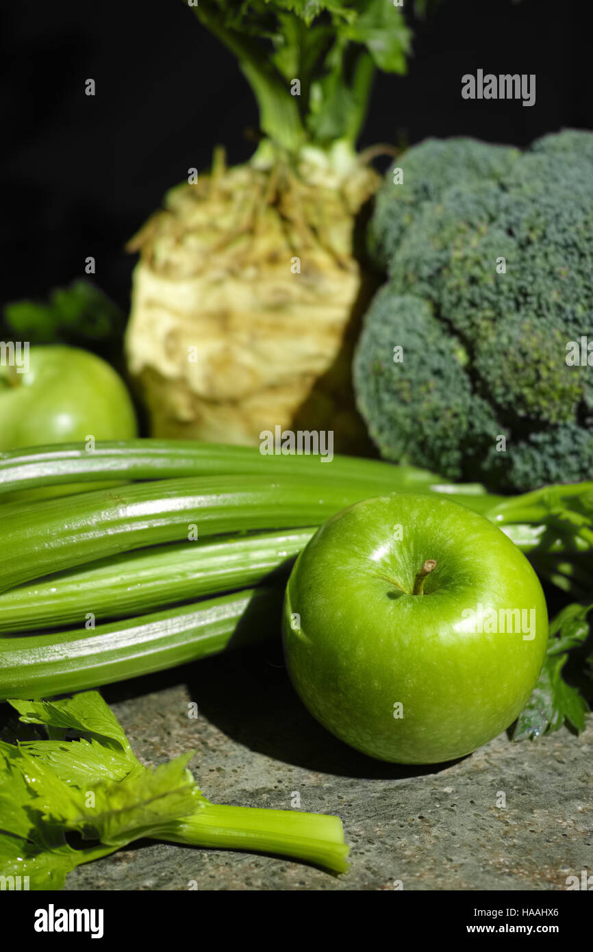 Green vegetables and fruits - celery, apples, celery root celeriac ...