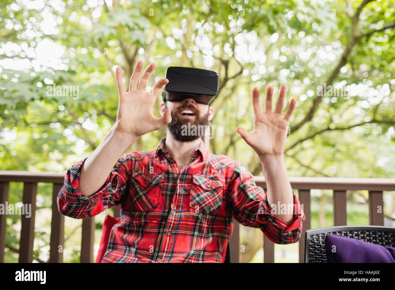 Man using virtual reality headset Stock Photo - Alamy