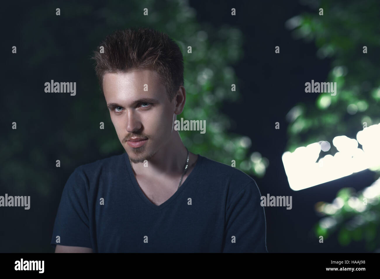 man in the forest at night Stock Photo - Alamy