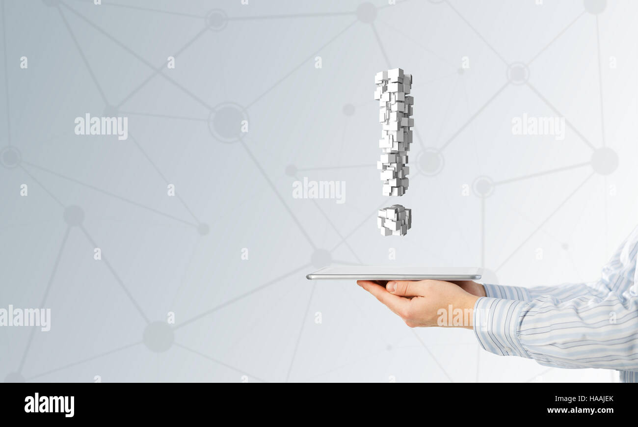 Exclamation mark and tablet Stock Photo - Alamy