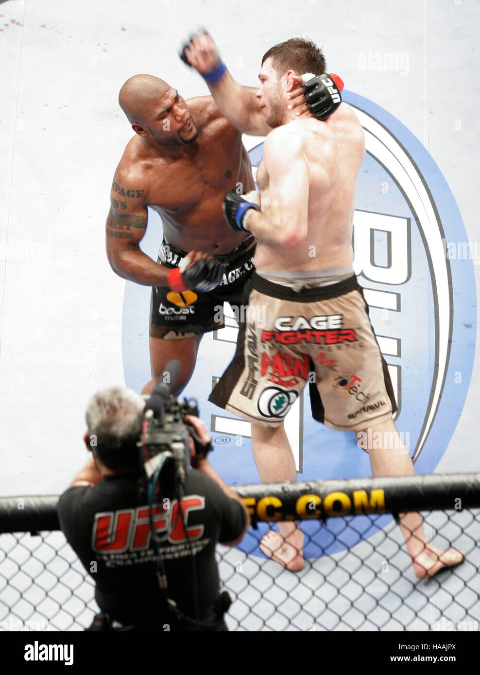 Forrest Griffin (tan shorts) fights Quinton Jackson (black shorts ...