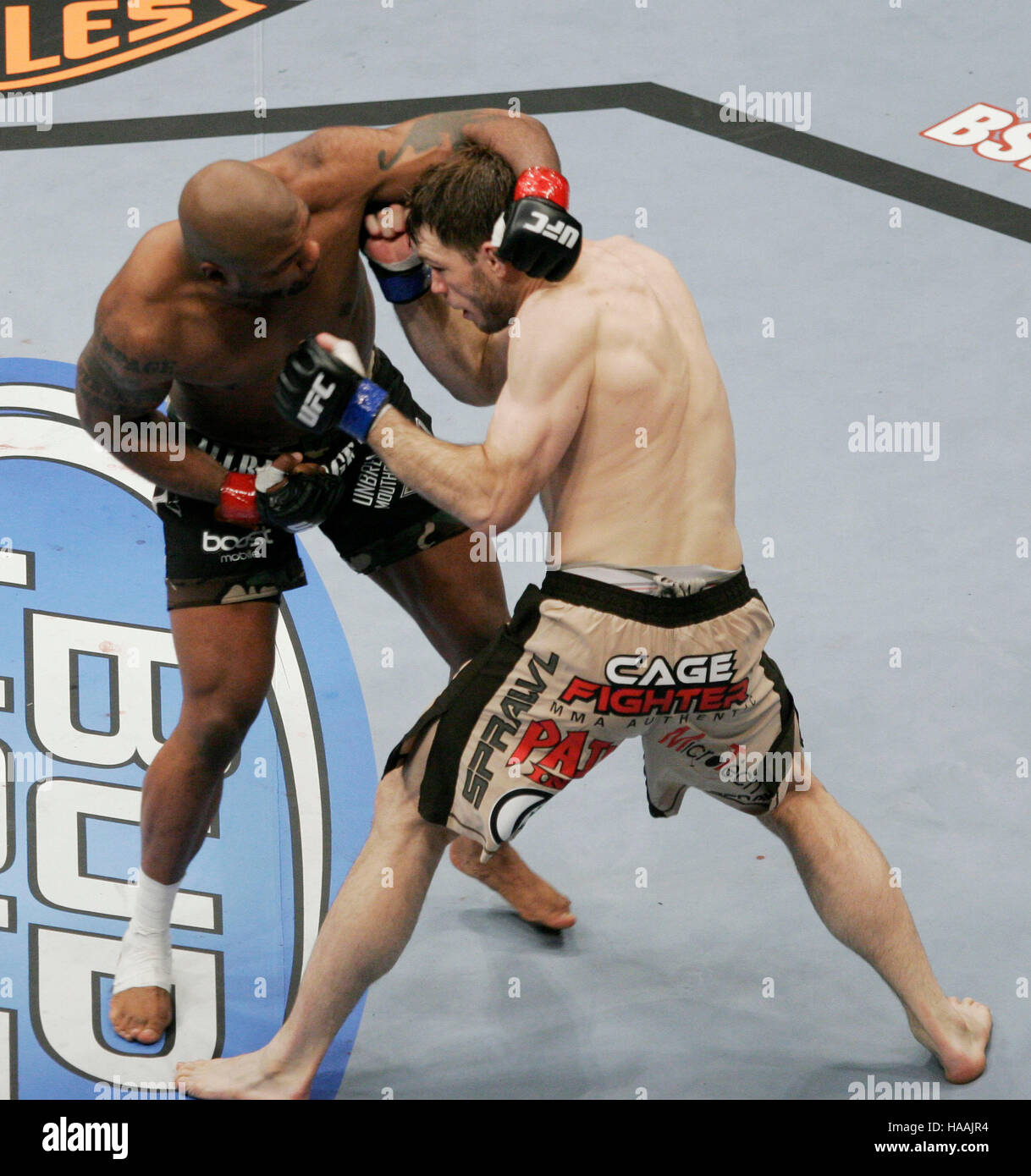 Forrest Griffin (tan shorts) fights Quinton Jackson (black shorts ...