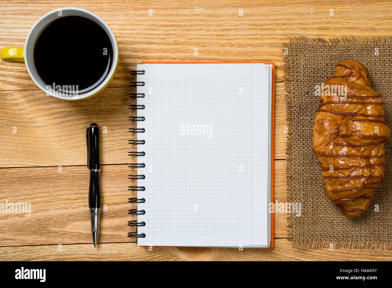 Coffee break with snack Stock Photo - Alamy