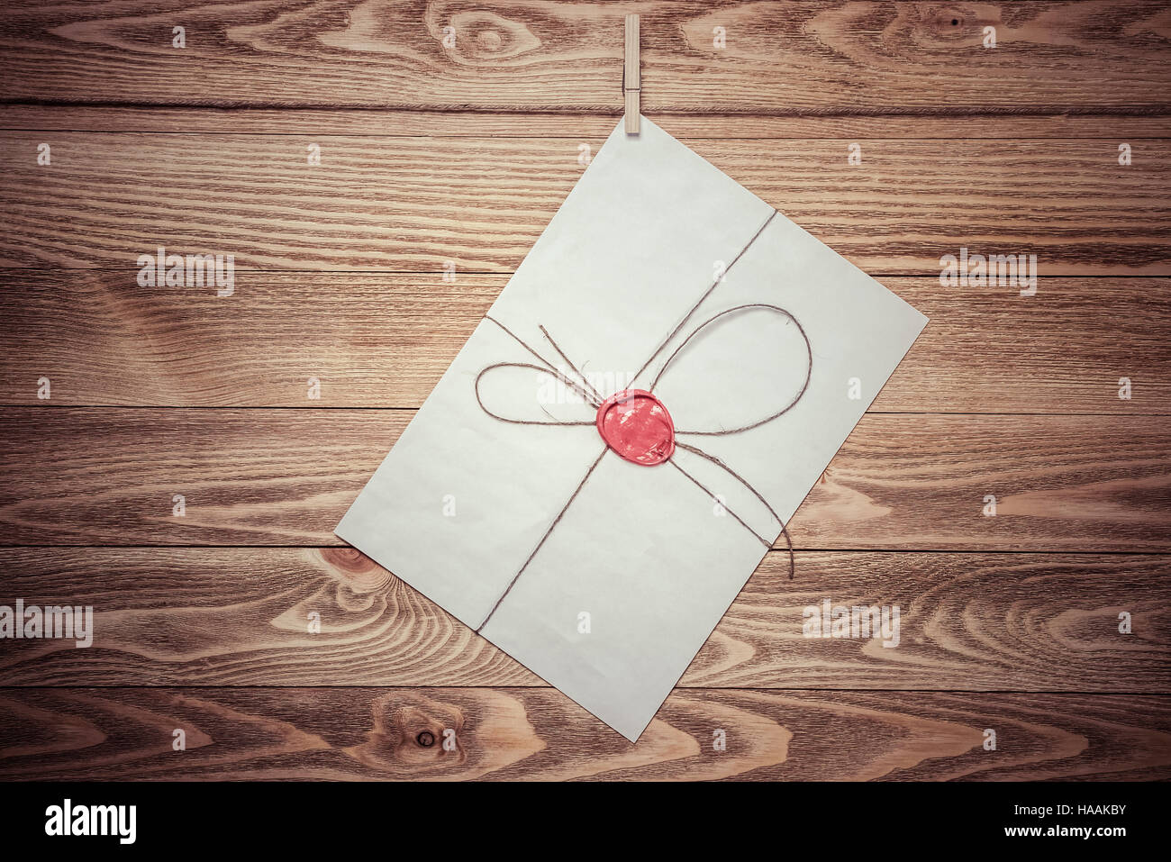 Mail envelope on rope Stock Photo - Alamy