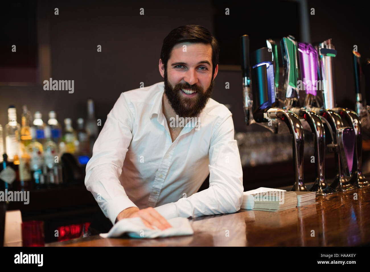 Young man cleaning counter hi-res stock photography and images - Alamy