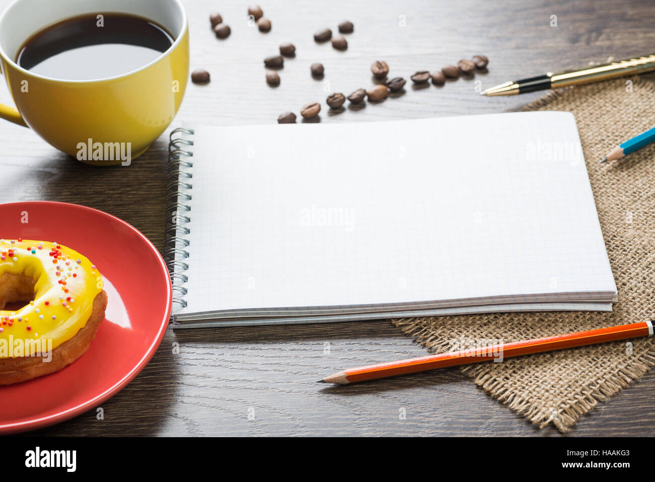 Coffee break with snack Stock Photo - Alamy