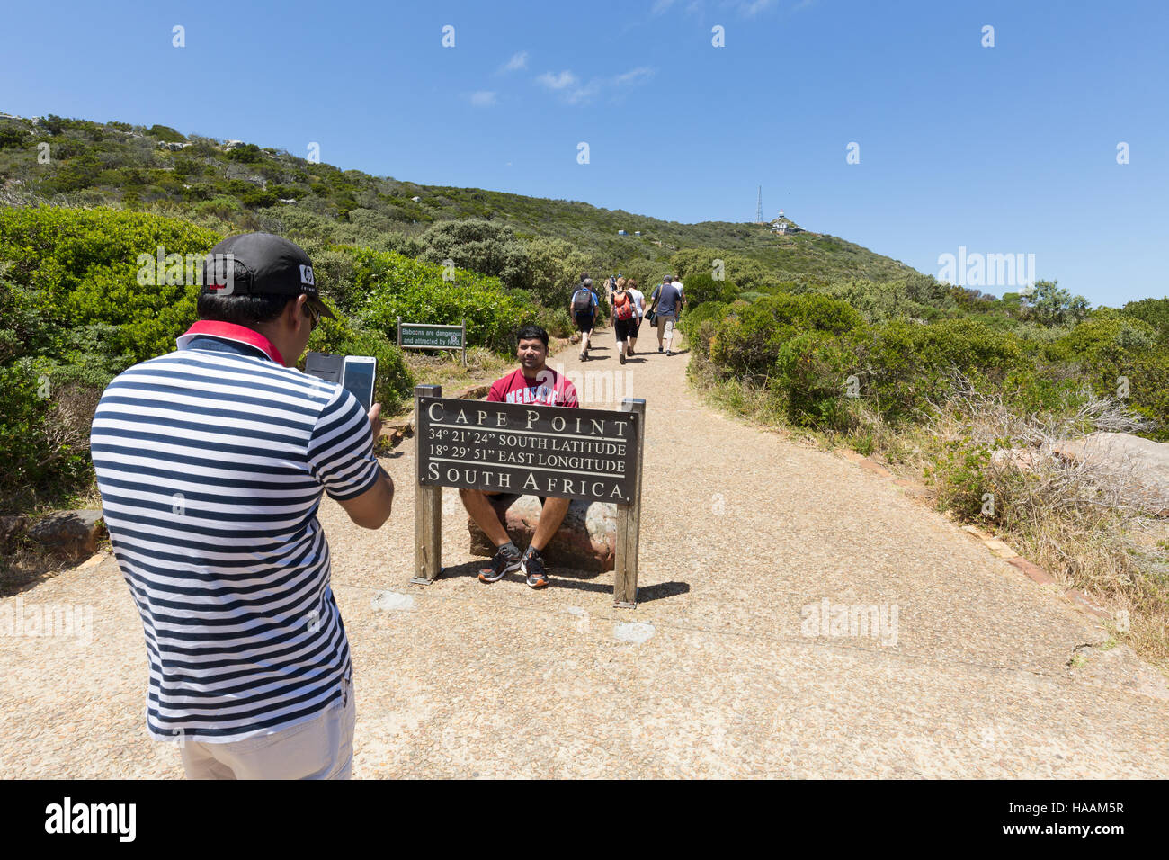 Tourists at the Cape Point sign, Cape Point, Cape Peninsula, Western ...