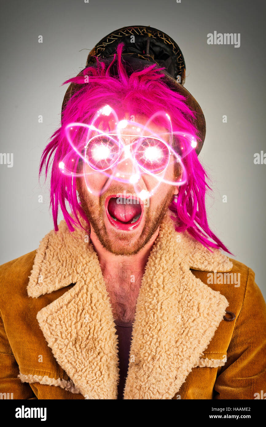 Pink haired bearded lunatic with atomic particle sunglasses Stock Photo ...