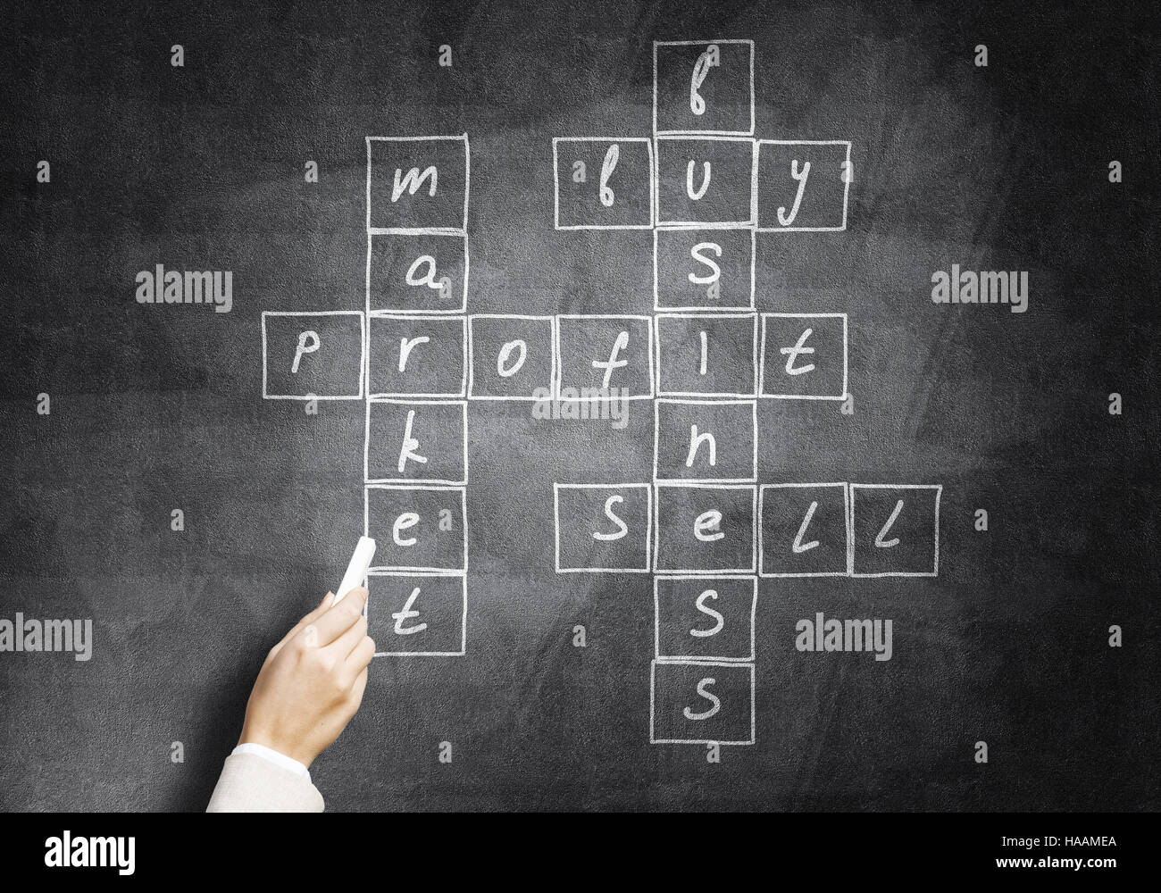Woman draw crossword Stock Photo - Alamy