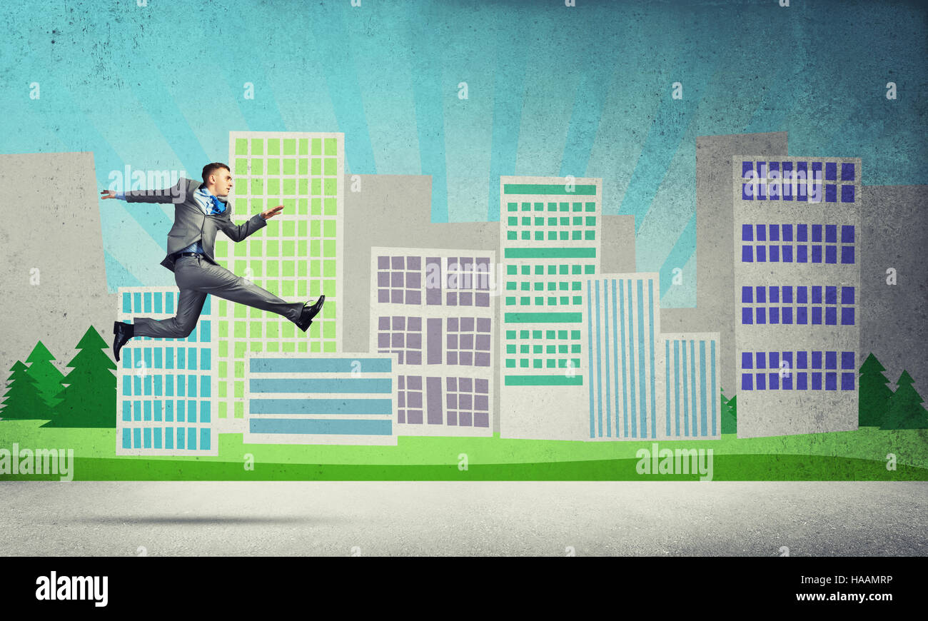 Businessman jumping high Stock Photo - Alamy