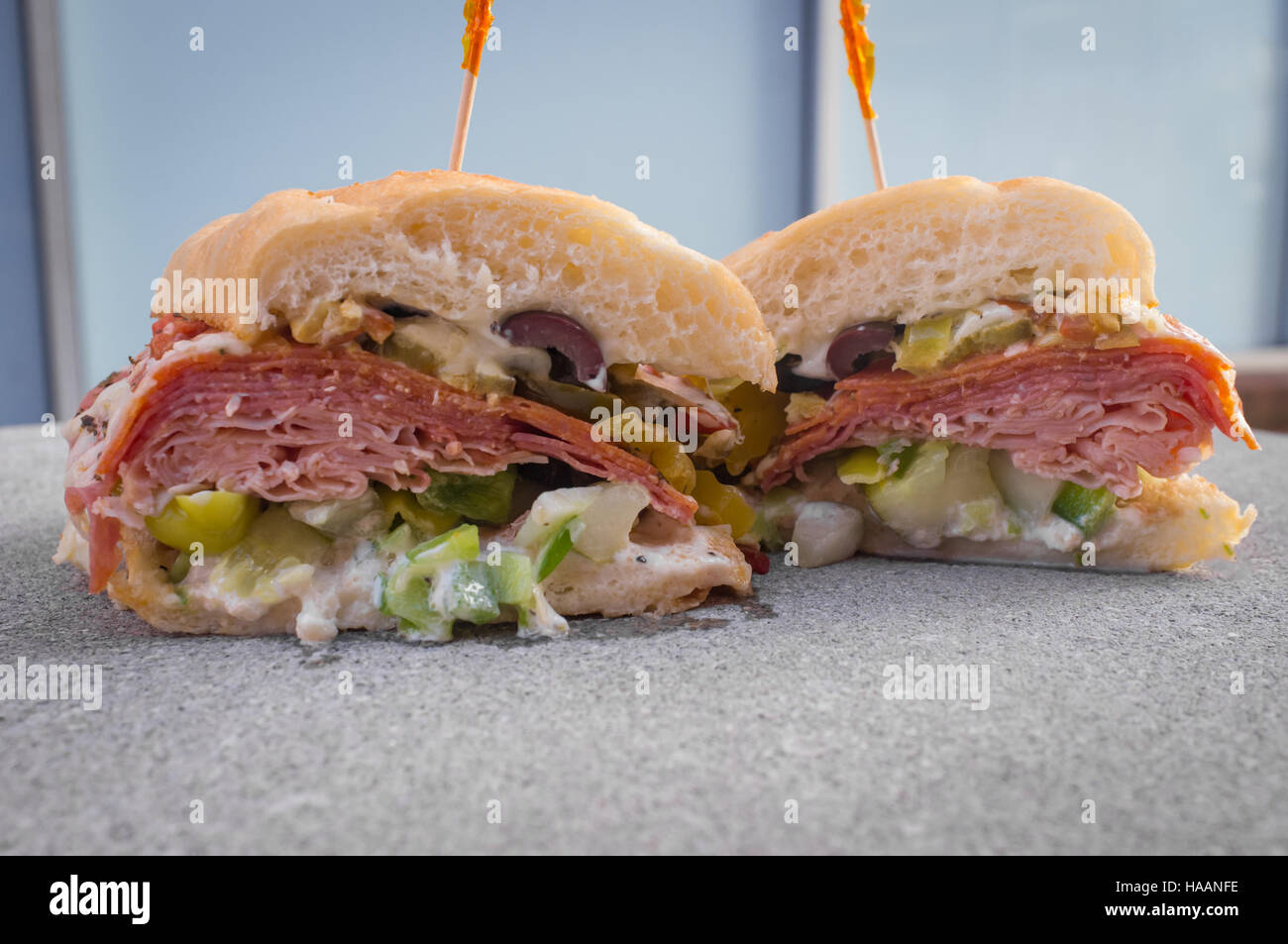 The works Italian sub sandwich with fancy toothpicks Stock Photo - Alamy