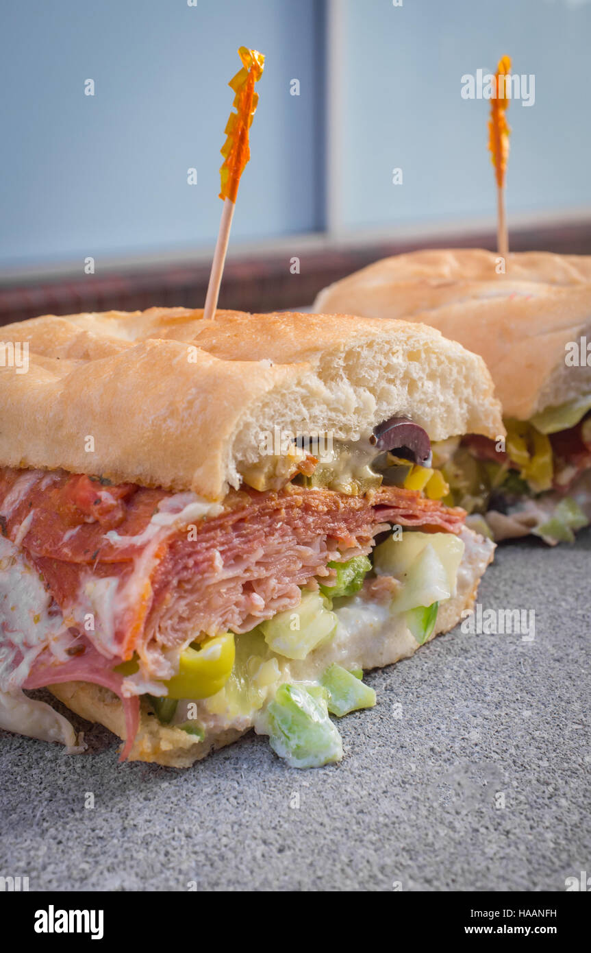 The works Italian sub sandwich with fancy toothpicks Stock Photo - Alamy