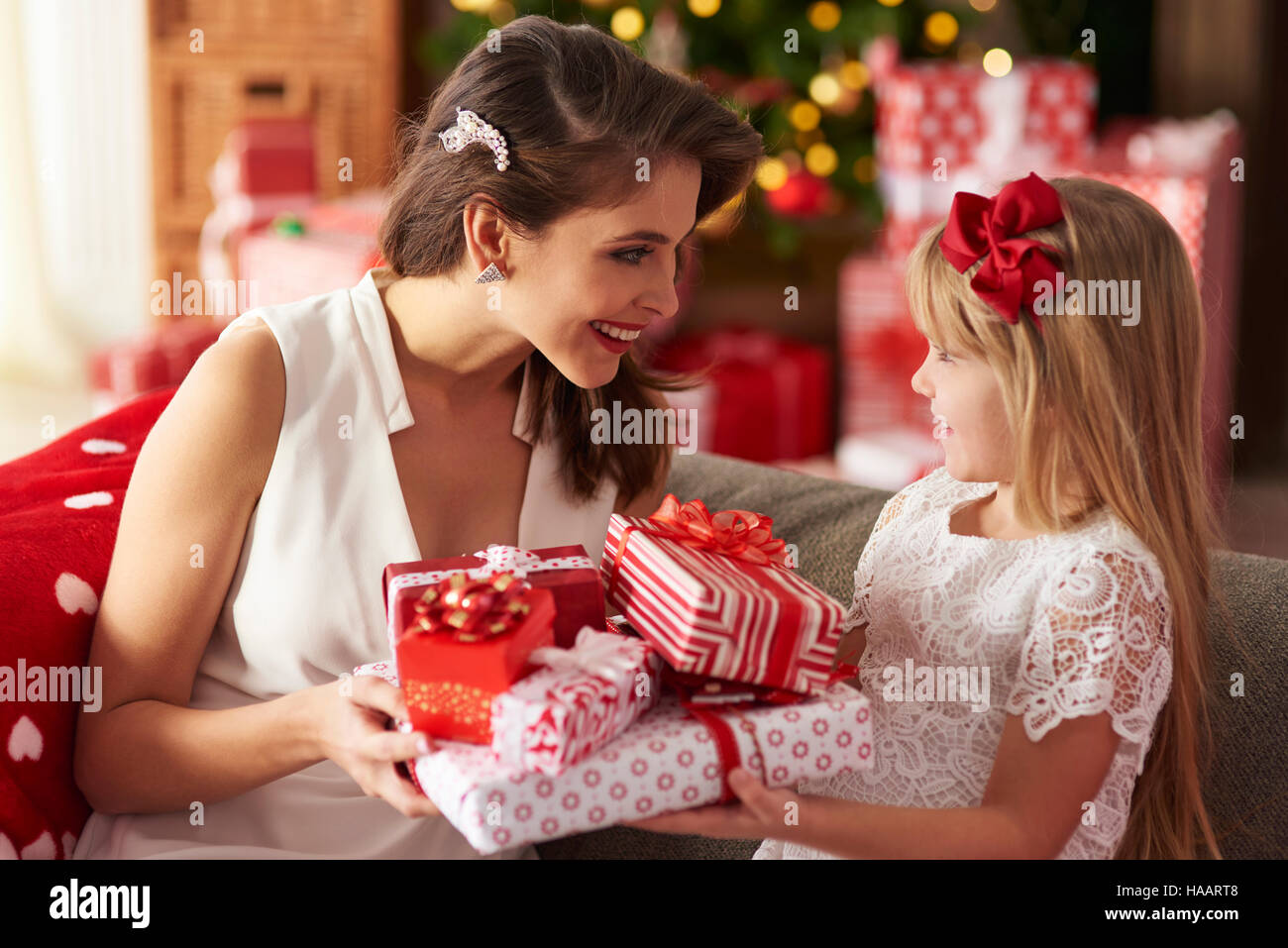 Face to face during exchanging presents Stock Photo - Alamy