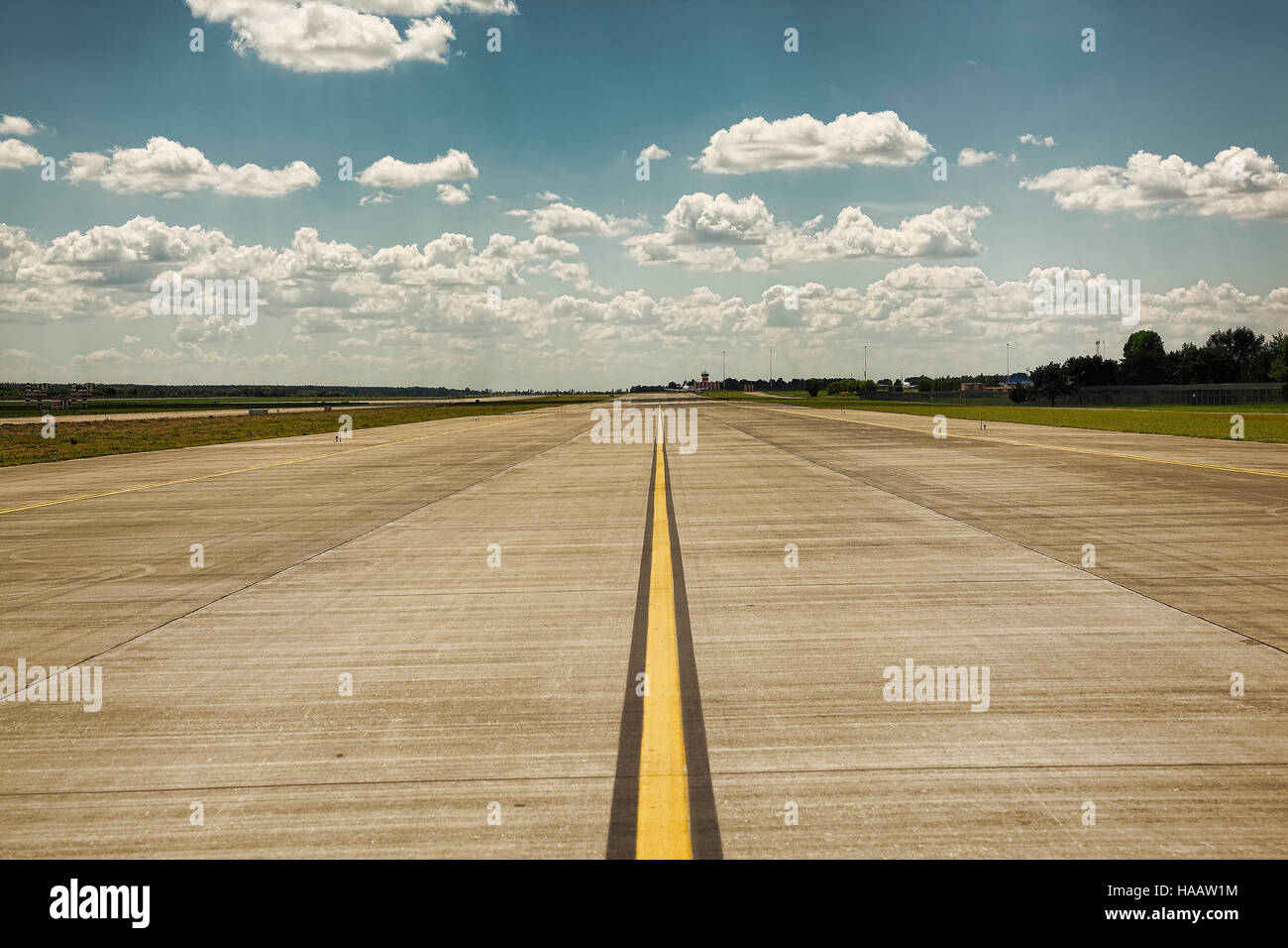 Empty runway in the airport on a sunny summer day Stock Photo - Alamy